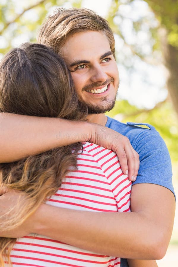 Cute Couple Hugging in the Park Stock Photo - Image of caucasian ...