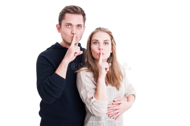 Cute Couple Making Shush Gesture With Index Finger Stock Photo - Image ...