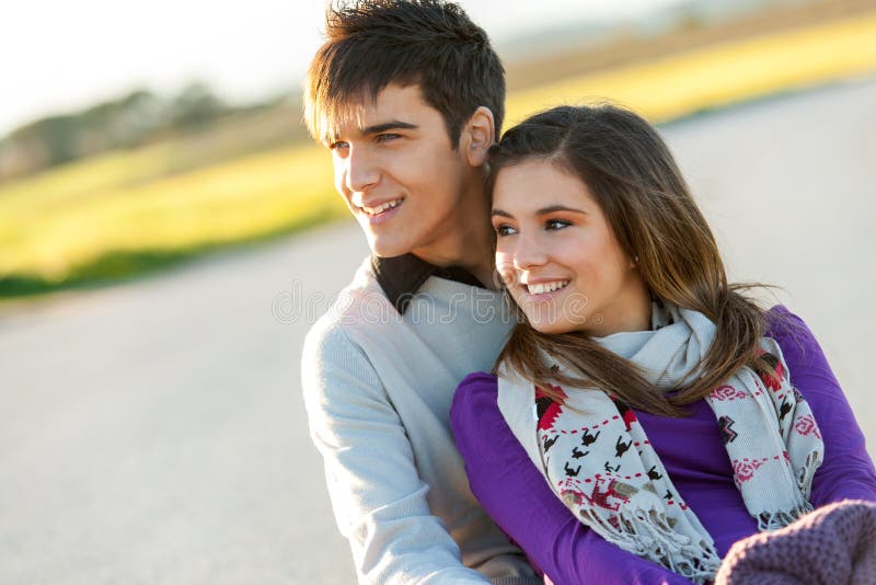 Cute Couple Sitting Together Outdoors. Stock Image - Image of lifestyle ...