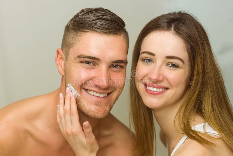 Cute Couple Smiling at Camera Stock Photo - Image of household, leisure ...