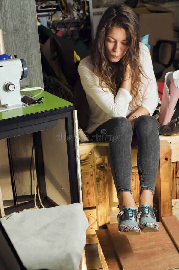 Cute Designer Shoemaker Looking at Her Work Stock Photo - Image of ...