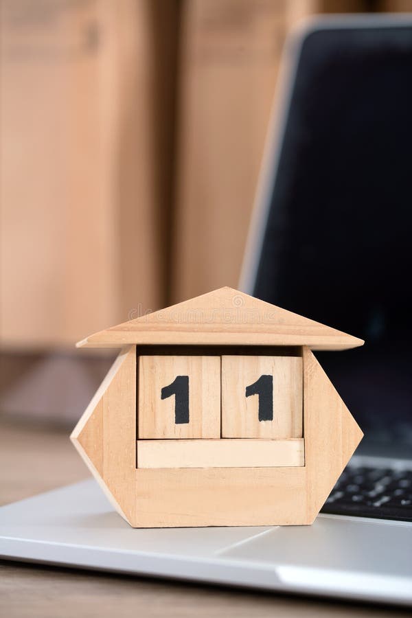 Cute Desk Calendar Showing the Number 11 on a Laptop Stock Photo ...