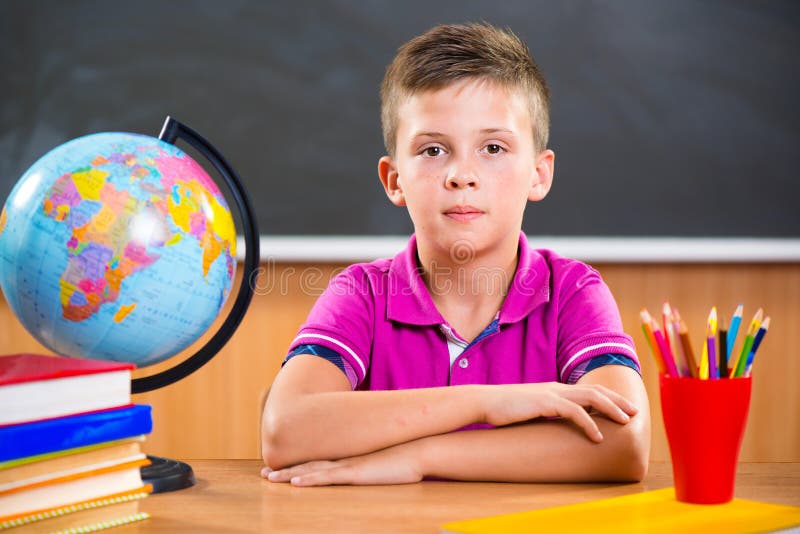 Cute Diligent Boy Sitting in Classroom Stock Photo - Image of learn ...