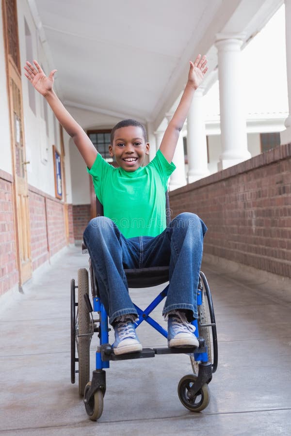 Cute Disabled Pupil Smiling at Camera in Hall Stock Photo - Image of ...