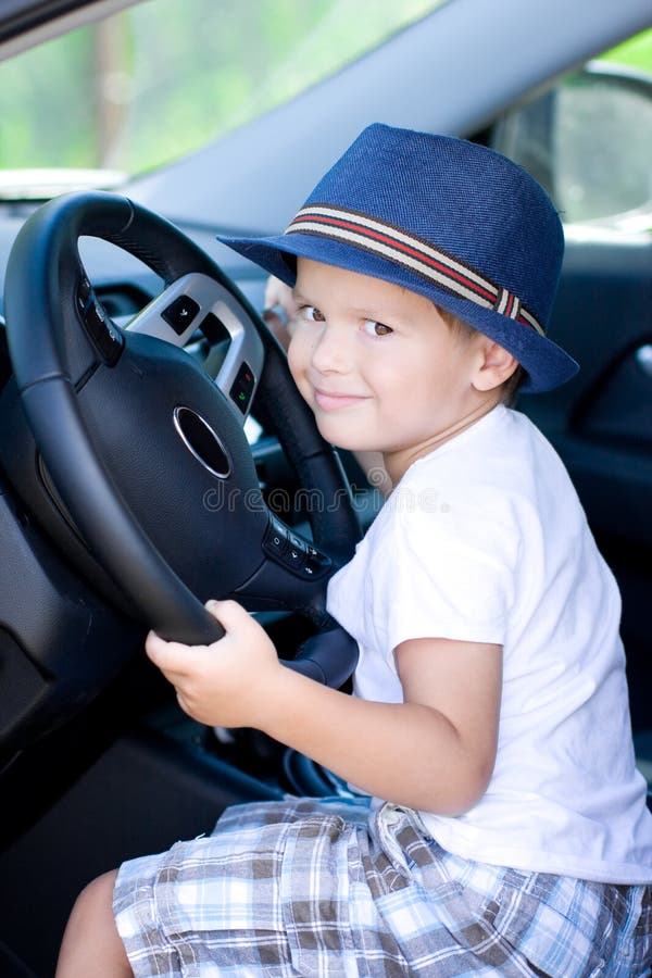 Cute Driver in Blue Hat Sits in Car Stock Image - Image of hair ...