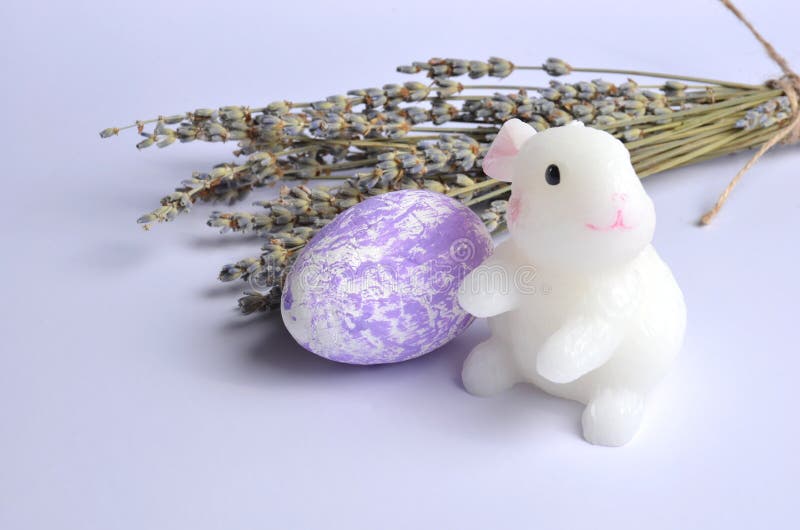 Cute Easter Bunny. Easter Egg on a Purple Background. Lavender. Easter ...