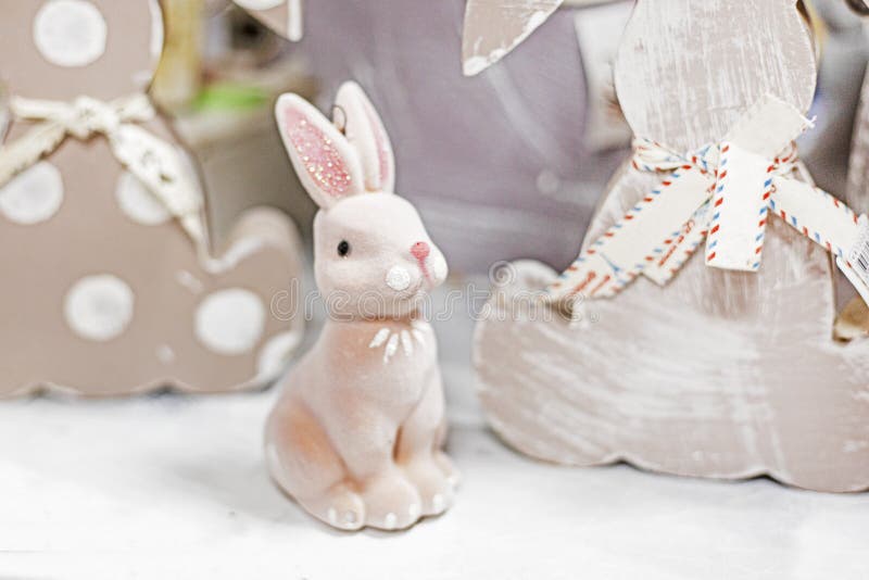 Cute Easter Bunny on Light Brown Background with Other Craft Bunnies ...