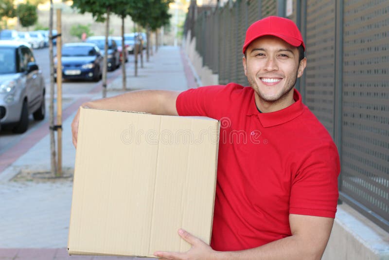 Cute Ethnic Delivery Man Smiling Outdoors Stock Image - Image of ...