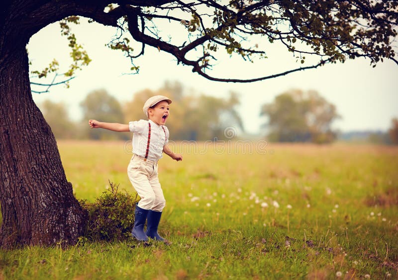 Cute Excited Boy Having Fun on Spring Field, Countryside Stock Image ...