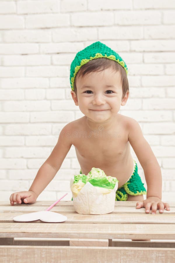 Cute Expression of Adorable Toddler with His Sponge Cake Stock Photo ...