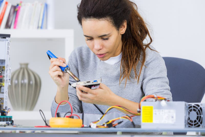 Cute Female Engineer at Home Working on Electronics Stock Photo - Image ...