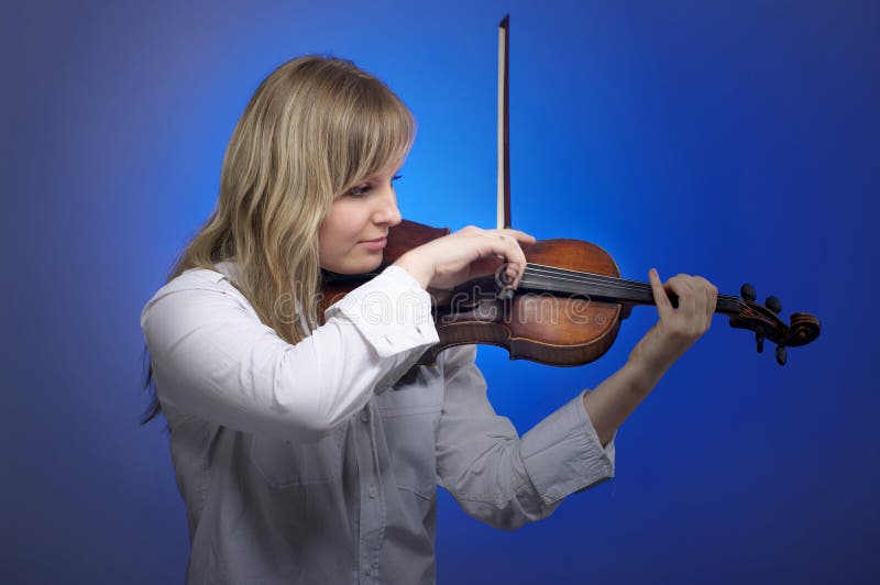 Beautiful female violinist stock image. Image of musician - 12205409
