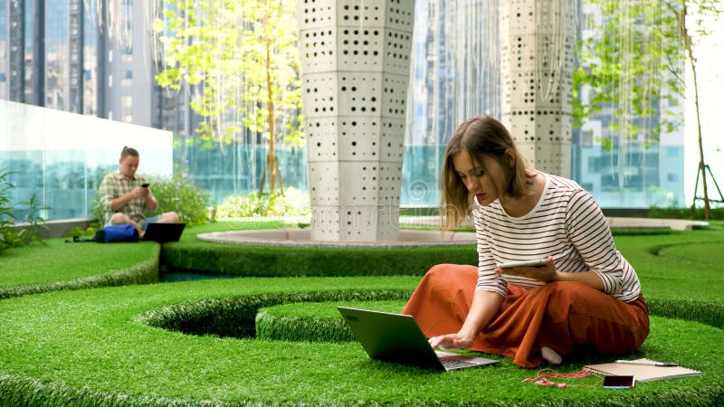 Cute Female Worker Inputs Data on Laptop Keyboard and Type Text on ...