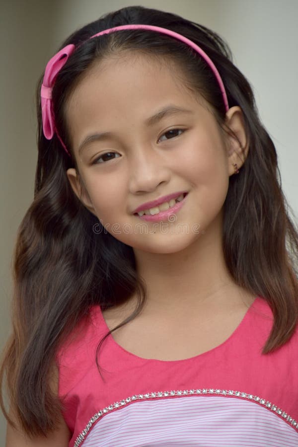 A Cute Filipina Girl Smiling Stock Photo - Image of minority, youth ...