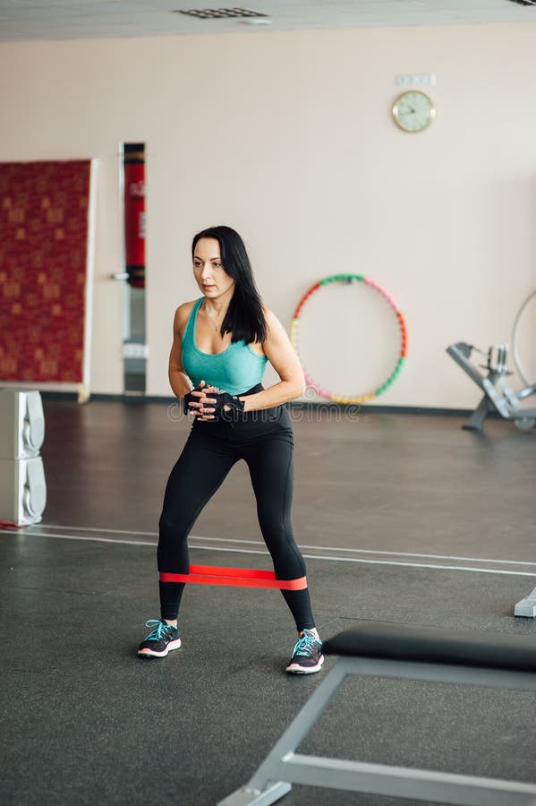 Cute Fit Girl Doing Exercises on the Simulator Stock Photo - Image of ...