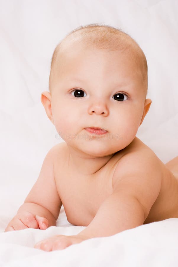 Cute Four Months Old Baby Boy on the Bed Stock Photo - Image of pink ...