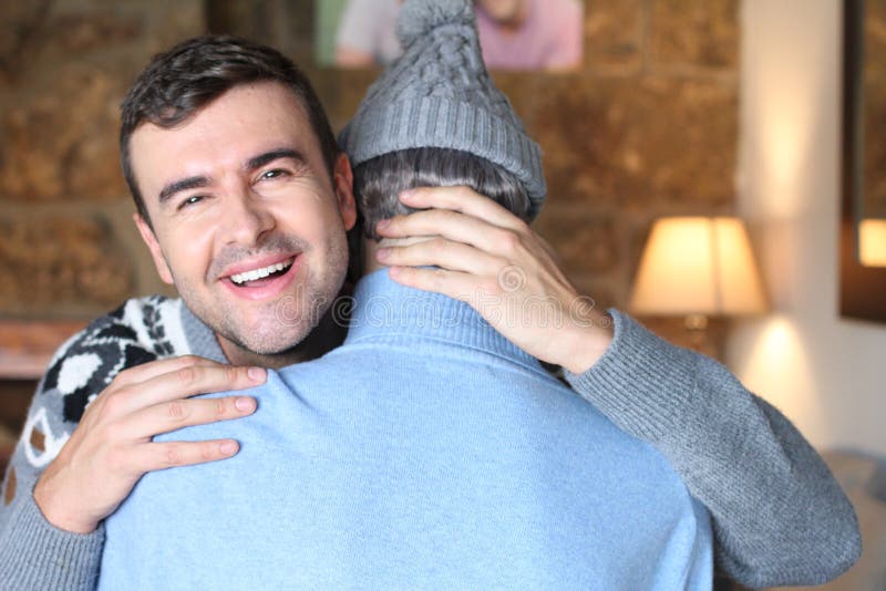 Cute gay man giving a hug stock photo. Image of lifestyle - 197455486