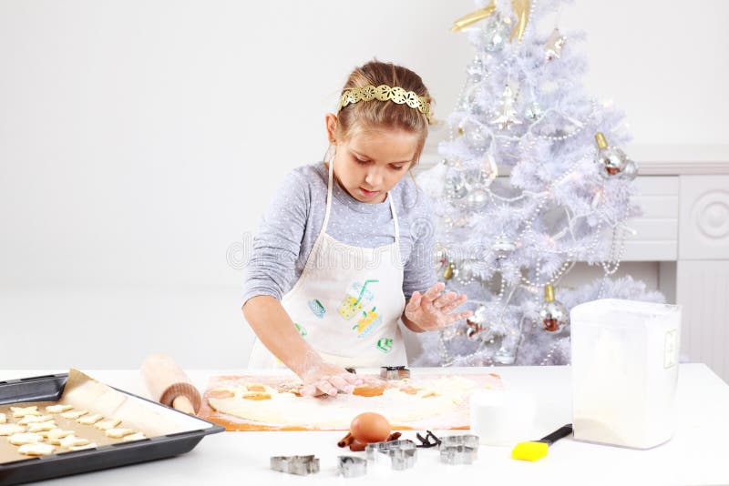 Cute girl baking cookies stock image. Image of cooking - 21904217