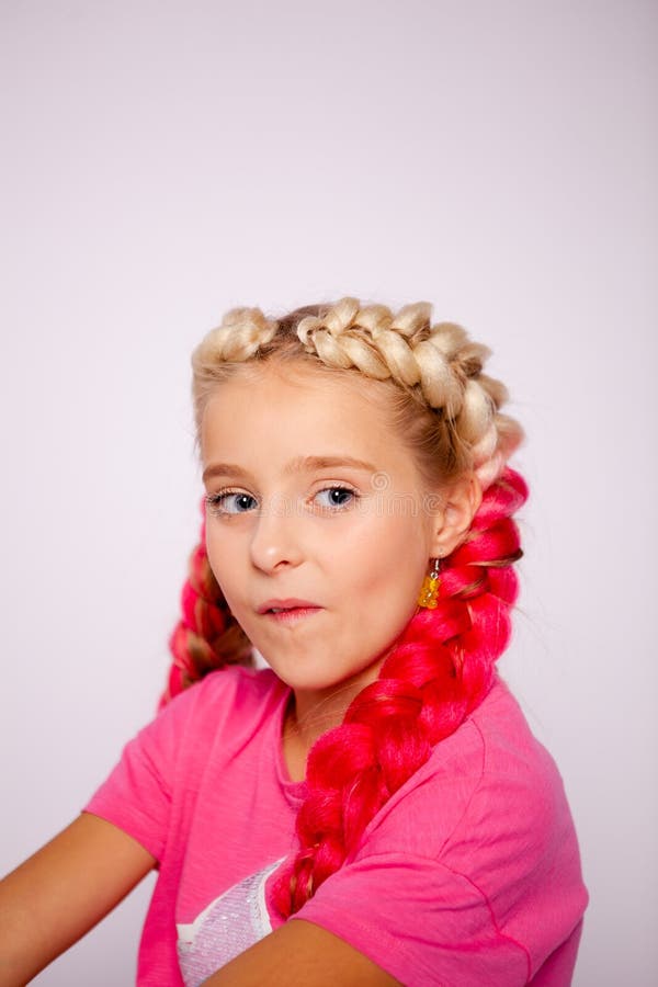 Cute Girl in Bright Colorful Clothes and with Colored Braids Stock ...