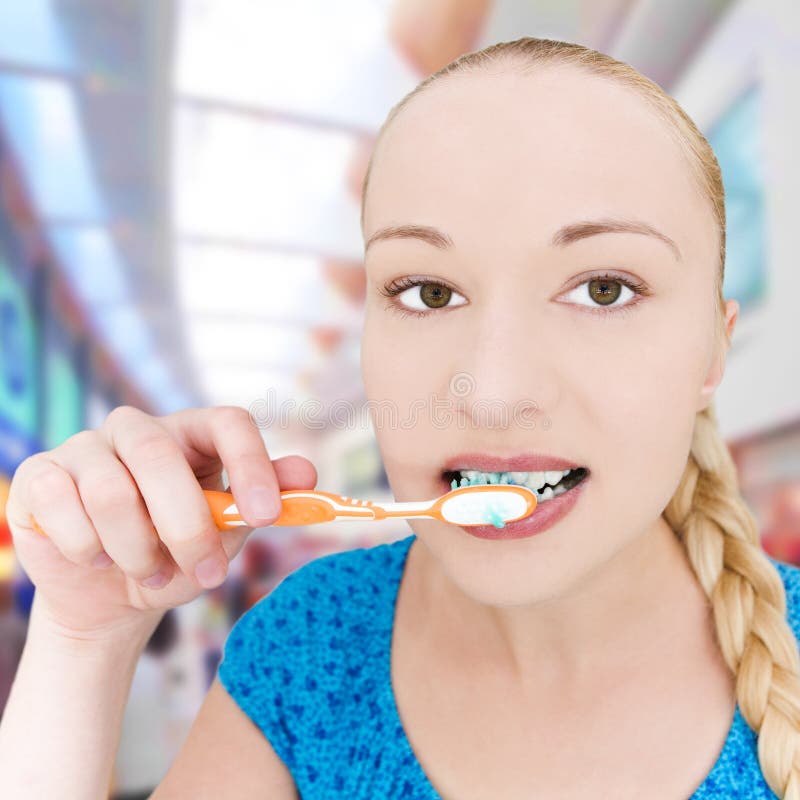 Girl Brushing Teeth - Free Photo from StockFreeImages
