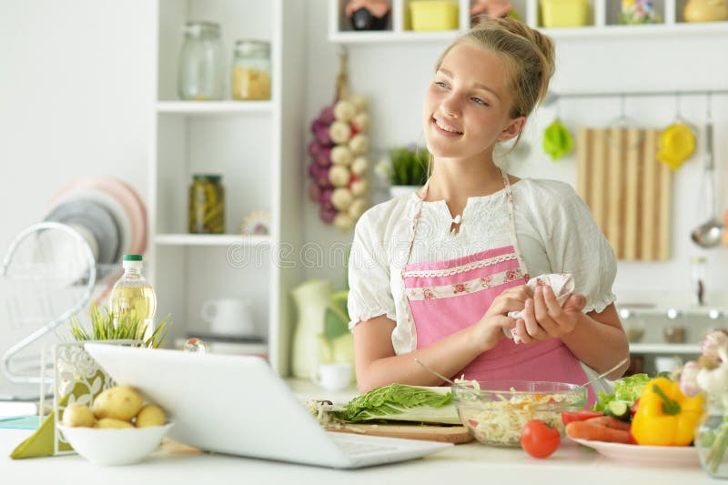 Cute girl cooking stock photo. Image of table, healthy - 277497548