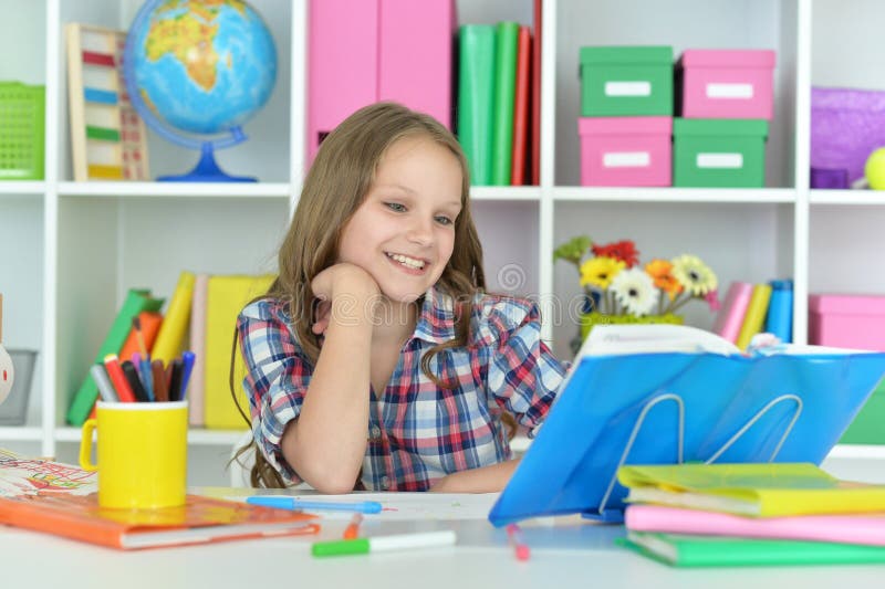 Cute girl does lessons stock photo. Image of schoolgirl - 88057220