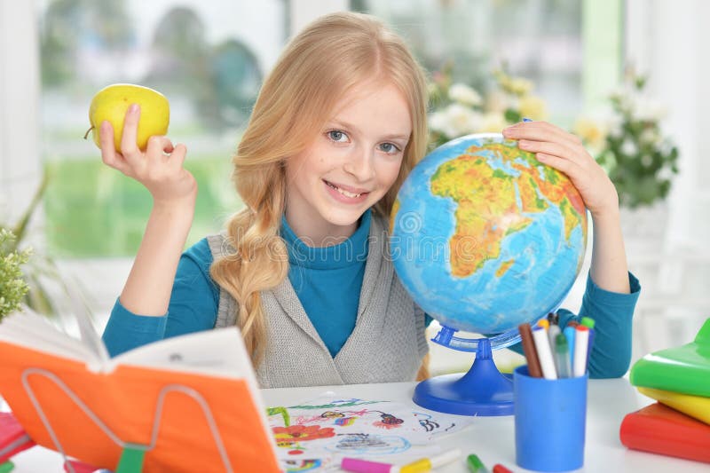 Cute girl does lessons stock image. Image of knowledge - 88121791