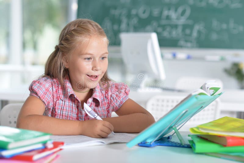 Cute girl does lessons stock photo. Image of learn, woman - 88352742