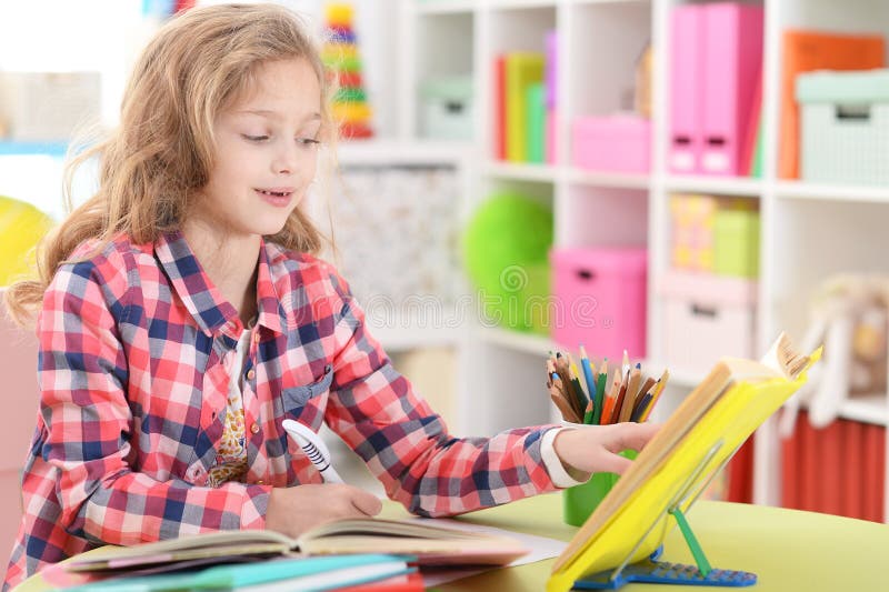 Cute girl does lessons stock photo. Image of people, happy - 89524458
