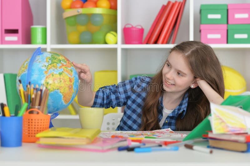 Cute Girl Doing Home Work at Desk Stock Photo - Image of school ...