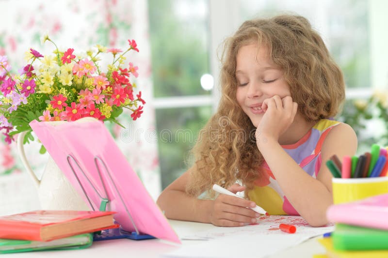 Cute Girl Doing Home Work at Desk Stock Photo - Image of feminine ...