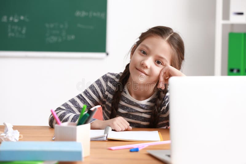 Cute Girl Doing Homework in Classroom Stock Image - Image of school ...