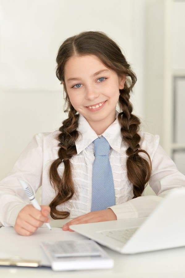 Cute girl doing homework stock photo. Image of cute - 106396660