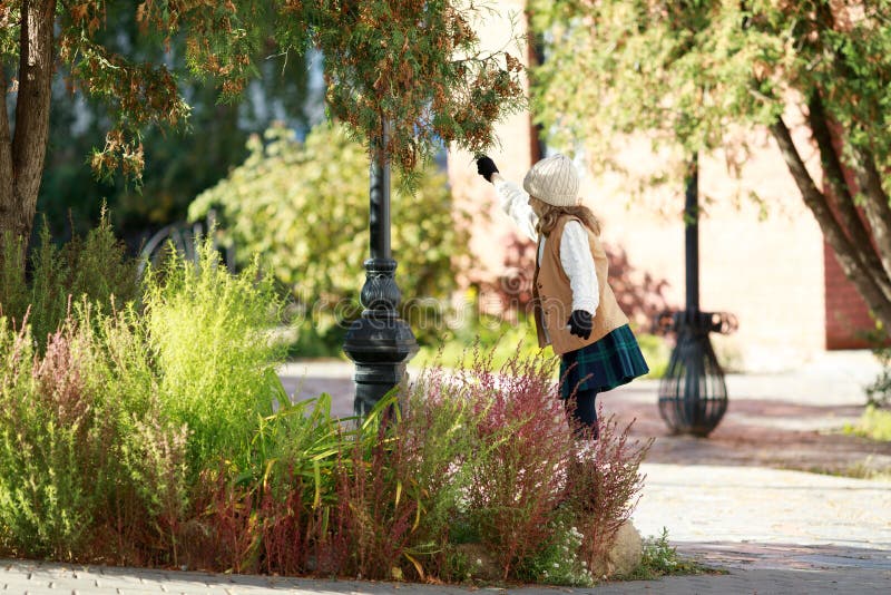 Cute Girl Dressed in Autumn Clothes on a Walk Stock Photo - Image of ...