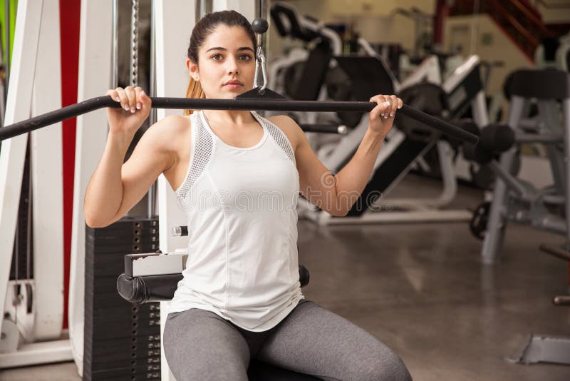 Cute Girl Exercising Her Back at the Gym Stock Image - Image of contact ...