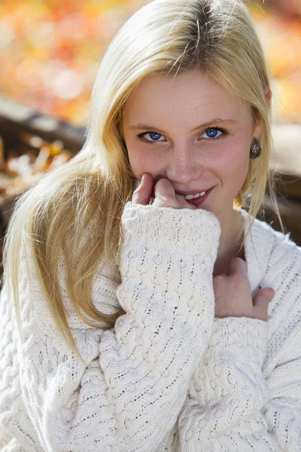 Cute girl in fall leaves stock photo. Image of female - 27649564