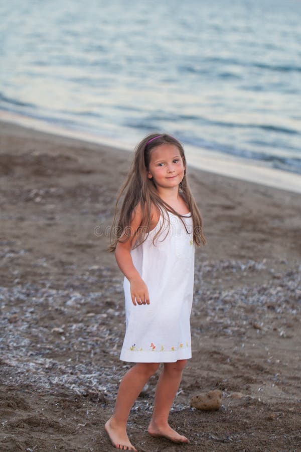 Cute Girl Having Fun on a Beach Stock Photo - Image of sand, girl: 95896336