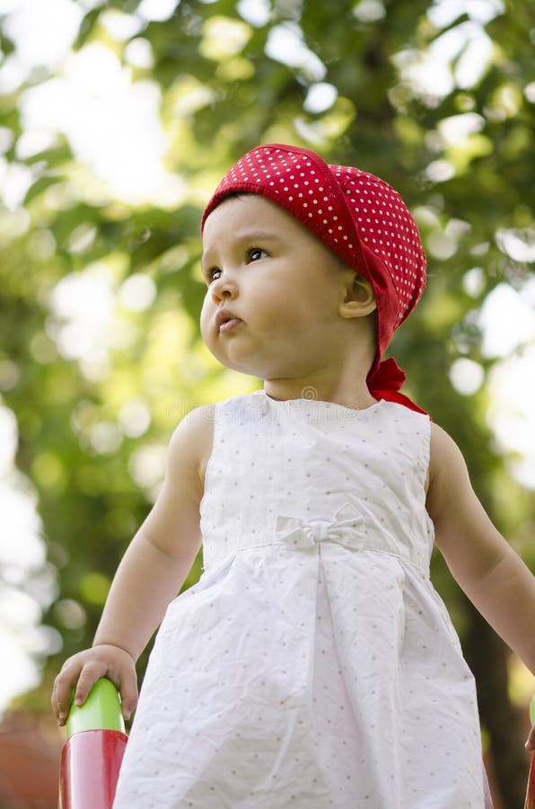 Cute Girl with an Innocent Look Stock Image - Image of cute, baby: 42849509