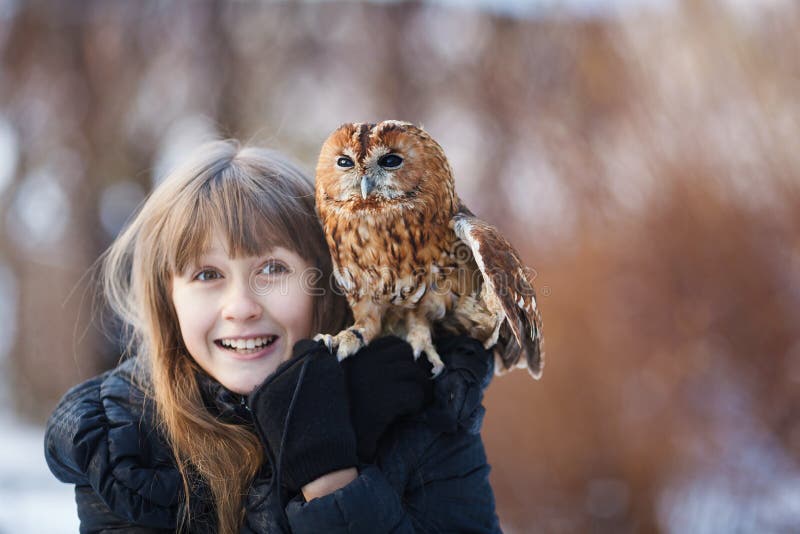 Cute girl with little owl stock photo. Image of cute - 50810082