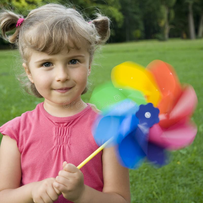 Cute Girl with Little Windmill Stock Image - Image of person, spinner ...