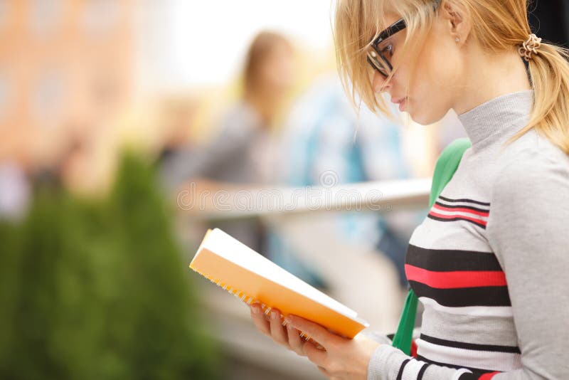 Cute Girl with Notepad in Hands on Street Stock Image - Image of ...