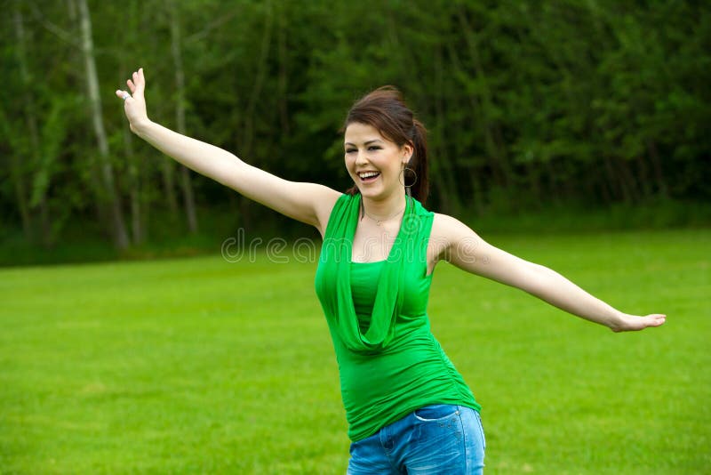 Cute Girl with Open Arms in Green Field. Stock Photo - Image of open ...