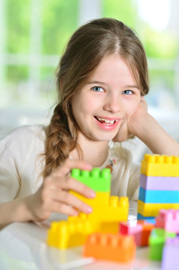 Cute Girl Playing with Blocks Stock Photo - Image of beautiful, blocks ...