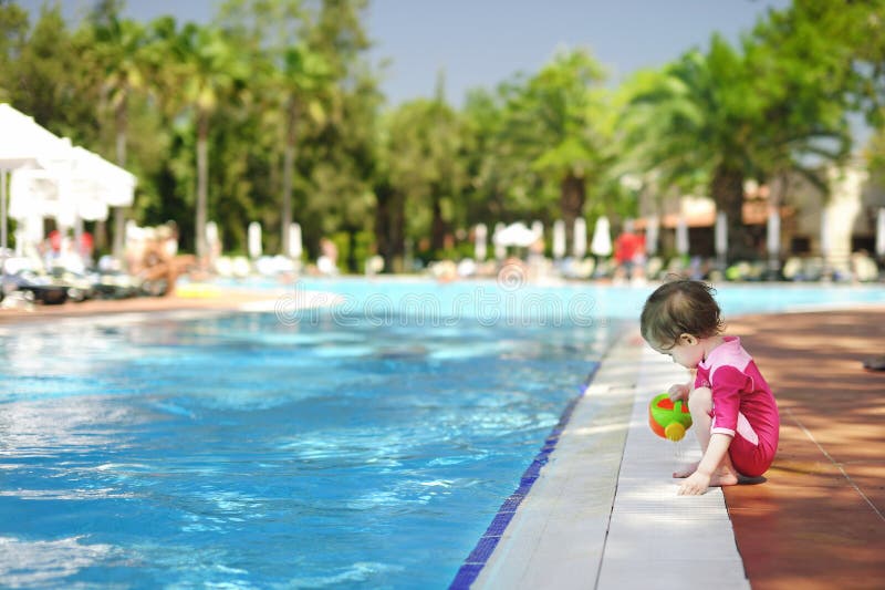 Cute Girl Playing in Swimming Pool Stock Image - Image of vacation ...