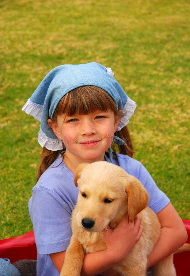 Cute girl with puppy dog stock image. Image of park, puppy - 6518527
