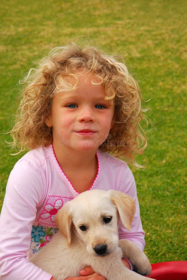 Cute girl with puppy dog stock image. Image of park, puppy - 6518527