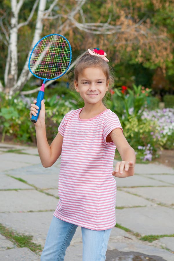 Cute Girl with Racket Outdoors Stock Photo - Image of leisure, years ...