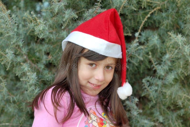 Cute girl with santa hat stock photo. Image of preschooler - 16414538