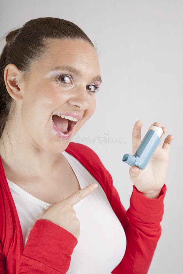 Cute Girl Showing an Asthma Inhaler Stock Photo - Image of bronchial ...