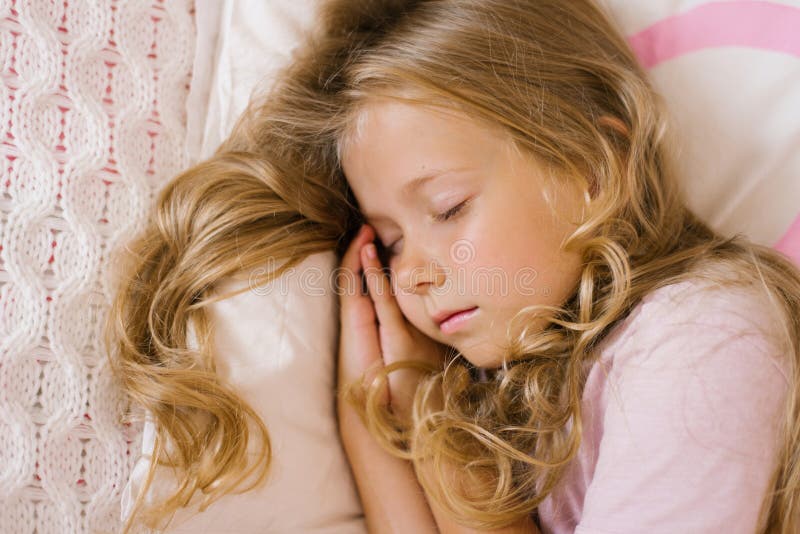 Cute Girl Sleeps Sweetly on a Pillow Stock Photo - Image of ...